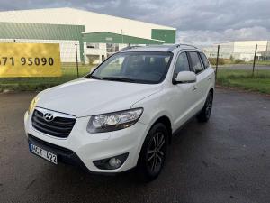 Balts Hyundai Santa Fe 2010 Viļņa, ar dzinēja tilpumu 2.20 L un nobraukumu 125 tūkst. km par 5650 €, foto 24 vietnē AUTOMOTO.COM.LV