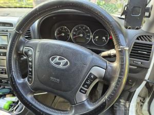 White Hyundai Santa Fe 2011 in Madona, with an engine capacity of 2.20 L and mileage of 150 thousand km for 1600 €, photo 6 on AUTOMOTO.COM.LV