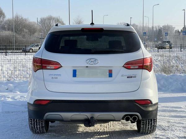 White Hyundai Santa Fe 2012 in Taurage, with an engine capacity of 2.20 L and mileage of 218 thousand km for 9950 €, photo 7 on AUTOMOTO.COM.LV