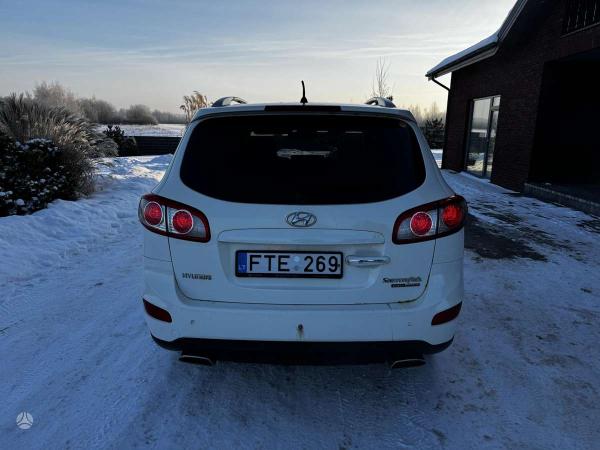 Balts Hyundai Santa Fe 2012 Kauņa, ar dzinēja tilpumu 2.20 L un nobraukumu 441 tūkst. km par 3700 €, foto 5 vietnē AUTOMOTO.COM.LV