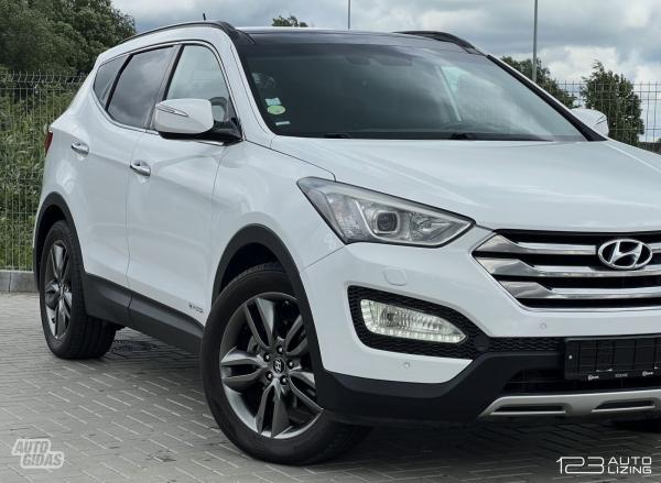 White Hyundai Santa Fe 2012 in Taurage, with an engine capacity of 2.20 L and mileage of 218 thousand km for 9300 €, photo 4 on AUTOMOTO.COM.LV