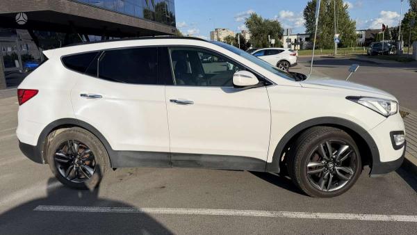 White Hyundai Santa Fe 2012 in Kaunas, with an engine capacity of 2.20 L and mileage of 253 thousand km for 9600 €, photo 10 on AUTOMOTO.COM.LV