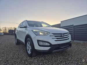 Balts Hyundai Santa Fe 2013 Vilkaviškis, ar dzinēja tilpumu 2.20 L un nobraukumu 203 tūkst. km par 12300 €, foto  vietnē AUTOMOTO.COM.LV