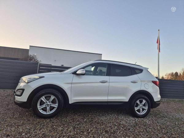 White Hyundai Santa Fe 2013 in Vilkaviskis, with an engine capacity of 2.20 L and mileage of 203 thousand km for 12300 €, photo 9 on AUTOMOTO.COM.LV