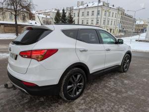 White Hyundai Santa Fe 2013 in Vilnius, with an engine capacity of 2.20 L and mileage of 272 thousand km for 10400 €, photo 2 on AUTOMOTO.COM.LV