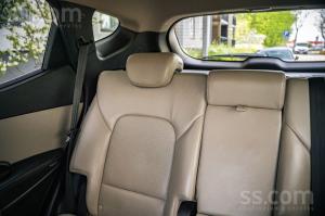 White Hyundai Santa Fe 2013 in Riga, with an engine capacity of 2.20 L and mileage of 0 thousand km for 9990 €, photo 19 on AUTOMOTO.COM.LV