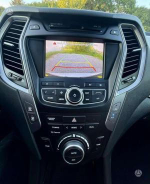 White Hyundai Santa Fe 2013 in Siauliai, with an engine capacity of 2.20 L and mileage of 250 thousand km for 13750 €, photo 35 on AUTOMOTO.COM.LV