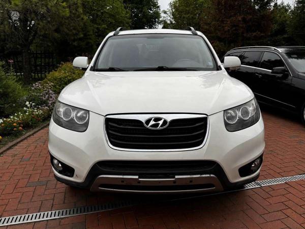 Balts Hyundai Santa Fe 2013 Pasvalys, ar dzinēja tilpumu 2.00 L un nobraukumu 240 tūkst. km par 5300 €, foto 7 vietnē AUTOMOTO.COM.LV