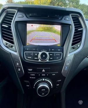 White Hyundai Santa Fe 2013 in Siauliai, with an engine capacity of 2.20 L and mileage of 250 thousand km for 13750 €, photo 35 on AUTOMOTO.COM.LV