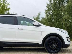 White Hyundai Santa Fe 2013 in Siauliai, with an engine capacity of 2.20 L and mileage of 171 thousand km for 13450 €, photo 11 on AUTOMOTO.COM.LV