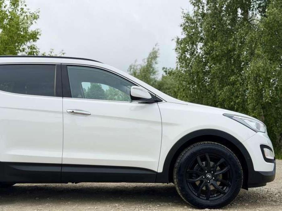 White Hyundai Santa Fe 2013 in Siauliai, with an engine capacity of 2.20 L and mileage of 171 thousand km for 13450 €, photo 11 on AUTOMOTO.COM.LV