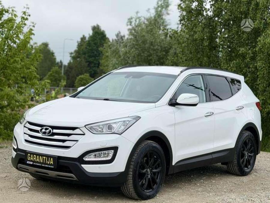 White Hyundai Santa Fe 2013 in Siauliai, with an engine capacity of 2.20 L and mileage of 171 thousand km for 13450 €, photo 21 on AUTOMOTO.COM.LV