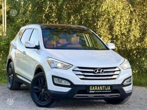 White Hyundai Santa Fe 2013 in Siauliai, with an engine capacity of 2.20 L and mileage of 250 thousand km for 13750 €, photo 4 on AUTOMOTO.COM.LV