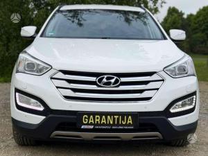 White Hyundai Santa Fe 2013 in Siauliai, with an engine capacity of 2.20 L and mileage of 171 thousand km for 13450 €, photo 6 on AUTOMOTO.COM.LV