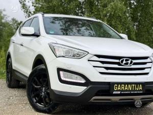 White Hyundai Santa Fe 2013 in Siauliai, with an engine capacity of 2.20 L and mileage of 171 thousand km for 13450 €, photo 16 on AUTOMOTO.COM.LV