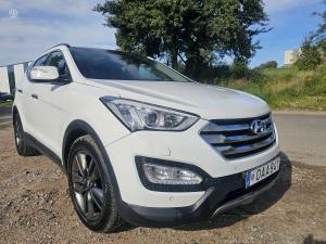 White Hyundai Santa Fe 2013 in Kaunas, with an engine capacity of 2.20 L and mileage of 253 thousand km for 8600 €, photo 4 on AUTOMOTO.COM.LV