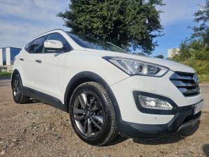 White Hyundai Santa Fe 2013 in Kaunas, with an engine capacity of 2.20 L and mileage of 253 thousand km for 8600 €, photo 5 on AUTOMOTO.COM.LV
