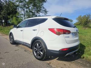 White Hyundai Santa Fe 2013 in Kaunas, with an engine capacity of 2.20 L and mileage of 253 thousand km for 8600 €, photo 16 on AUTOMOTO.COM.LV