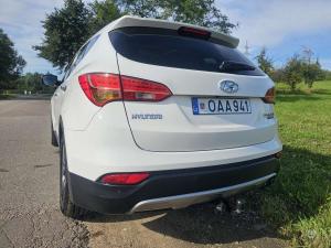 White Hyundai Santa Fe 2013 in Kaunas, with an engine capacity of 2.20 L and mileage of 253 thousand km for 8600 €, photo 18 on AUTOMOTO.COM.LV