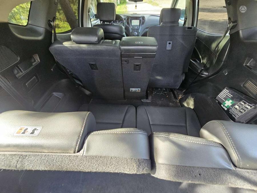 White Hyundai Santa Fe 2013 in Kaunas, with an engine capacity of 2.20 L and mileage of 253 thousand km for 8600 €, photo 31 on AUTOMOTO.COM.LV
