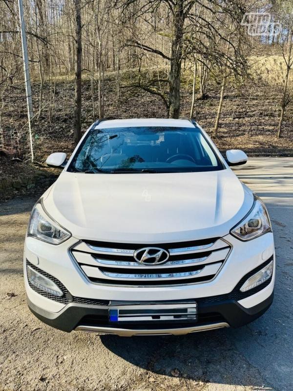 White Hyundai Santa Fe 2014 in Vilnius, with an engine capacity of 2.20 L and mileage of 123 thousand km for 12300 €, photo 3 on AUTOMOTO.COM.LV