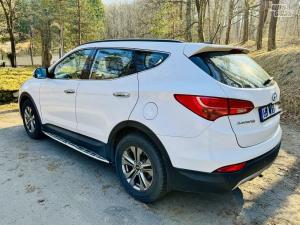 White Hyundai Santa Fe 2014 in Vilnius, with an engine capacity of 2.20 L and mileage of 124 thousand km for 10800 €, photo 5 on AUTOMOTO.COM.LV