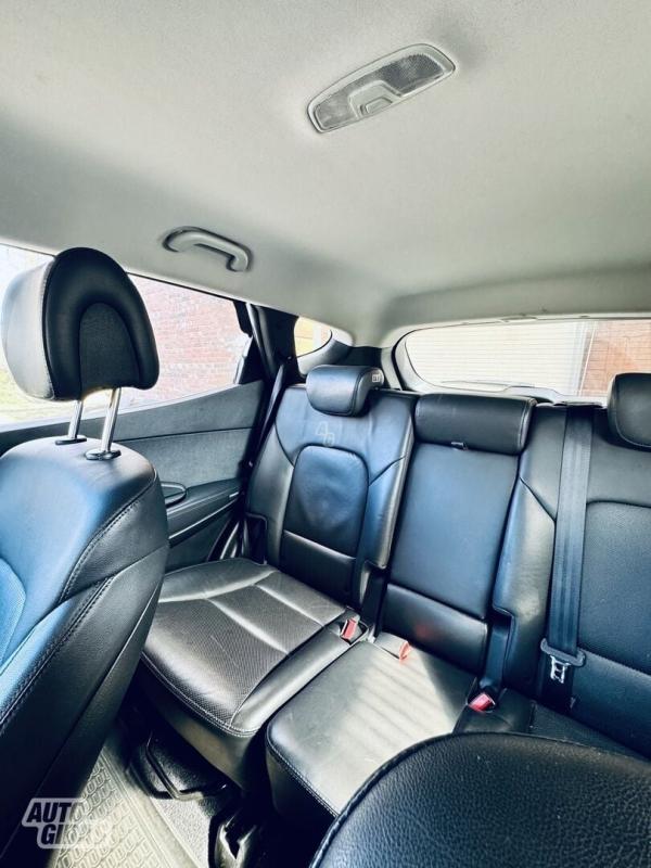 White Hyundai Santa Fe 2014 in Vilnius, with an engine capacity of 2.20 L and mileage of 124 thousand km for 10800 €, photo 7 on AUTOMOTO.COM.LV