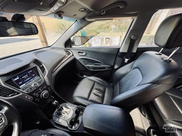 White Hyundai Santa Fe 2014 in Vilnius, with an engine capacity of 2.20 L and mileage of 124 thousand km for 10800 €, photo 8 on AUTOMOTO.COM.LV