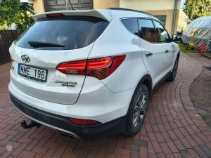 Balts Hyundai Santa Fe 2014 Viļņa, ar dzinēja tilpumu 2.20 L un nobraukumu 300 tūkst. km par 11200 €, foto  vietnē AUTOMOTO.COM.LV