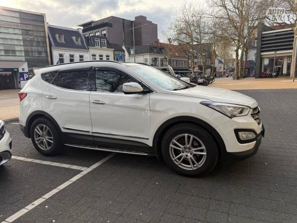 White Hyundai Santa Fe 2014 in Klaipeda, with an engine capacity of 2.20 L and mileage of 200 thousand km for 9900 €, photo 6 on AUTOMOTO.COM.LV