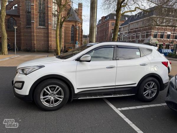 White Hyundai Santa Fe 2014 in Klaipeda, with an engine capacity of 2.20 L and mileage of 200 thousand km for 9900 €, photo 10 on AUTOMOTO.COM.LV