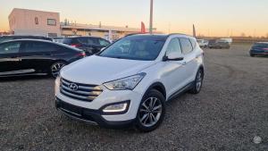 White Hyundai Santa Fe 2015 in Marijampole, with an engine capacity of 2.20 L and mileage of 230 thousand km for 11490 €, photo  on AUTOMOTO.COM.LV