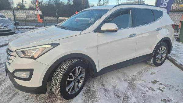 White Hyundai Santa Fe 2015 in Kaunas, with an engine capacity of 2.00 L and mileage of 106 thousand km for 12500 €, photo 4 on AUTOMOTO.COM.LV