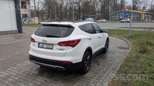 White Hyundai Santa Fe 2015 in Riga, with an engine capacity of 2.20 L and mileage of 134 thousand km for 14800 €, photo 4 on AUTOMOTO.COM.LV
