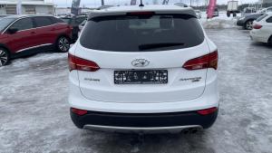White Hyundai Santa Fe 2015 in Marijampole, with an engine capacity of 2.20 L and mileage of 230 thousand km for 10800 €, photo 6 on AUTOMOTO.COM.LV