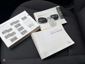 White Hyundai Santa Fe 2015 in Siauliai, with an engine capacity of 2.00 L and mileage of 290 thousand km for 8900 €, photo 22 on AUTOMOTO.COM.LV