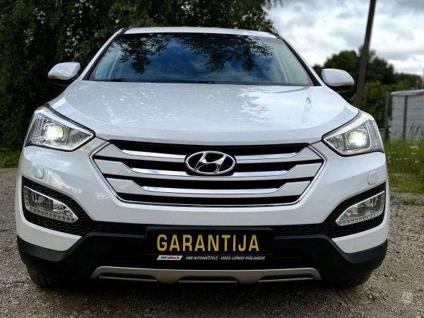 White Hyundai Santa Fe 2015 in Siauliai, with an engine capacity of 2.20 L and mileage of 195 thousand km for 14999 €, photo 5 on AUTOMOTO.COM.LV