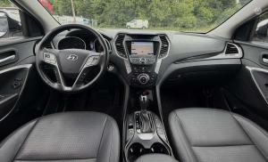White Hyundai Santa Fe 2015 in Siauliai, with an engine capacity of 2.20 L and mileage of 195 thousand km for 14999 €, photo 28 on AUTOMOTO.COM.LV