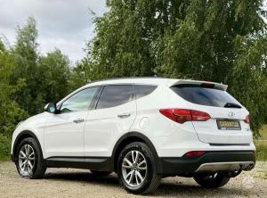 White Hyundai Santa Fe 2015 in Siauliai, with an engine capacity of 2.20 L and mileage of 195 thousand km for 14999 €, photo 4 on AUTOMOTO.COM.LV