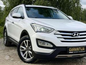 White Hyundai Santa Fe 2015 in Siauliai, with an engine capacity of 2.20 L and mileage of 195 thousand km for 14999 €, photo 16 on AUTOMOTO.COM.LV