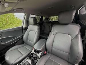 White Hyundai Santa Fe 2015 in Siauliai, with an engine capacity of 2.20 L and mileage of 195 thousand km for 14999 €, photo 27 on AUTOMOTO.COM.LV