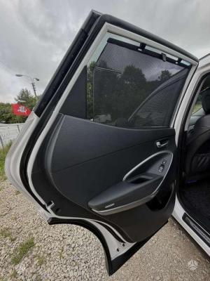 White Hyundai Santa Fe 2015 in Siauliai, with an engine capacity of 2.20 L and mileage of 195 thousand km for 14999 €, photo 45 on AUTOMOTO.COM.LV