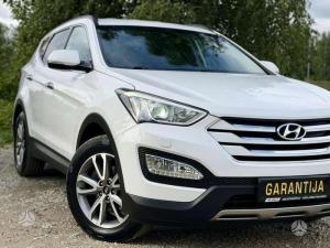 White Hyundai Santa Fe 2015 in Siauliai, with an engine capacity of 2.20 L and mileage of 195 thousand km for 14999 €, photo 16 on AUTOMOTO.COM.LV