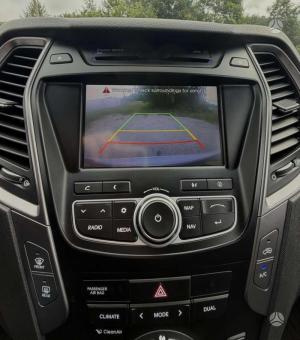 White Hyundai Santa Fe 2015 in Siauliai, with an engine capacity of 2.20 L and mileage of 195 thousand km for 14999 €, photo 42 on AUTOMOTO.COM.LV