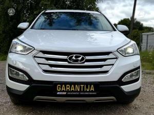 White Hyundai Santa Fe 2015 in Siauliai, with an engine capacity of 2.20 L and mileage of 195 thousand km for 14999 €, photo 6 on AUTOMOTO.COM.LV