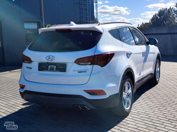 White Hyundai Santa Fe 2016 in Siauliai, with an engine capacity of 2.20 L and mileage of 197 thousand km for 14500 €, photo 4 on AUTOMOTO.COM.LV