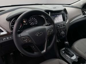 White Hyundai Santa Fe 2017 in Vilnius, with an engine capacity of 2.40 L and mileage of 88 thousand km for 10999 €, photo 14 on AUTOMOTO.COM.LV