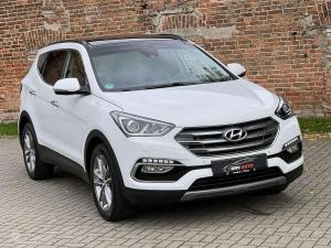 White Hyundai Santa Fe 2017 in Kedainiai, with an engine capacity of 2.20 L and mileage of 123 thousand km for 14750 €, photo 5 on AUTOMOTO.COM.LV