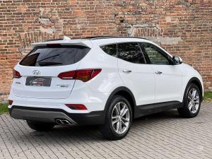 White Hyundai Santa Fe 2017 in Kedainiai, with an engine capacity of 2.20 L and mileage of 123 thousand km for 14750 €, photo 8 on AUTOMOTO.COM.LV