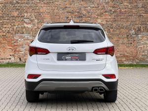 White Hyundai Santa Fe 2017 in Kedainiai, with an engine capacity of 2.20 L and mileage of 123 thousand km for 14750 €, photo 9 on AUTOMOTO.COM.LV